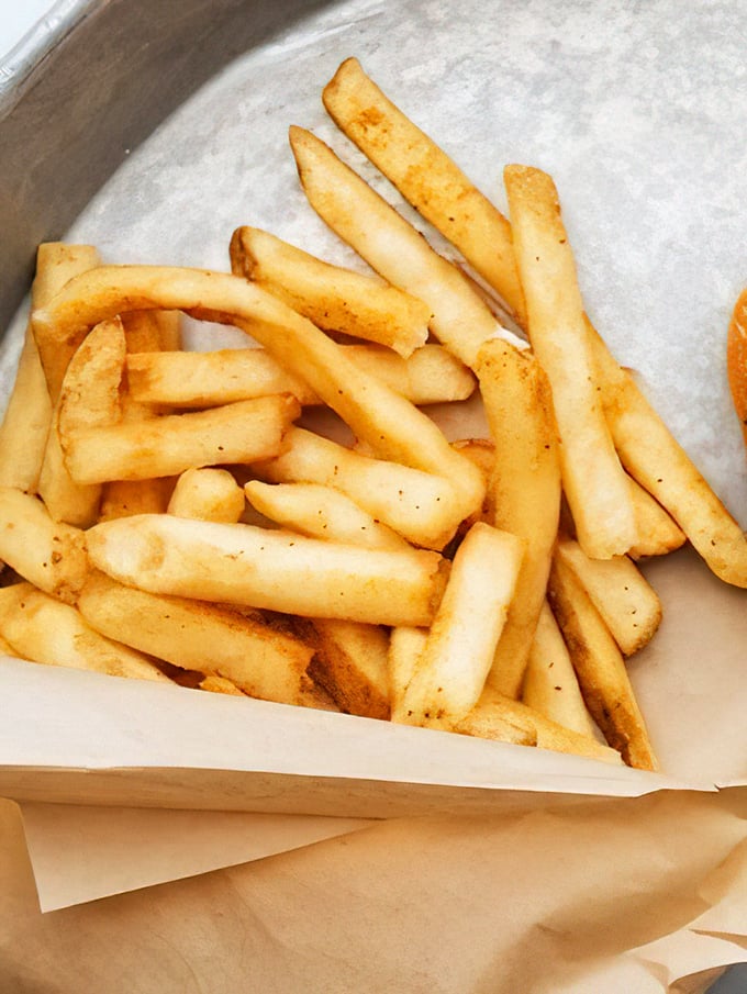 These aren't just fries; they're potato diplomats sent to negotiate peace between your taste buds and your diet resolutions.