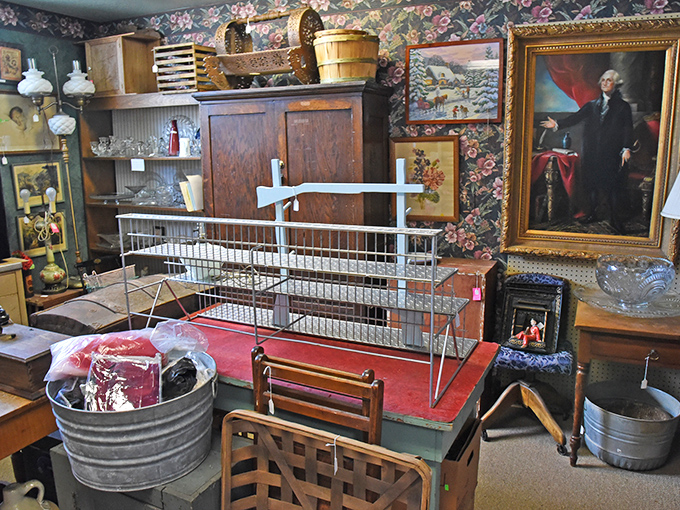 The George Washington portrait watches over antiques with the same intensity he once watched over a nation. No pressure, shoppers.