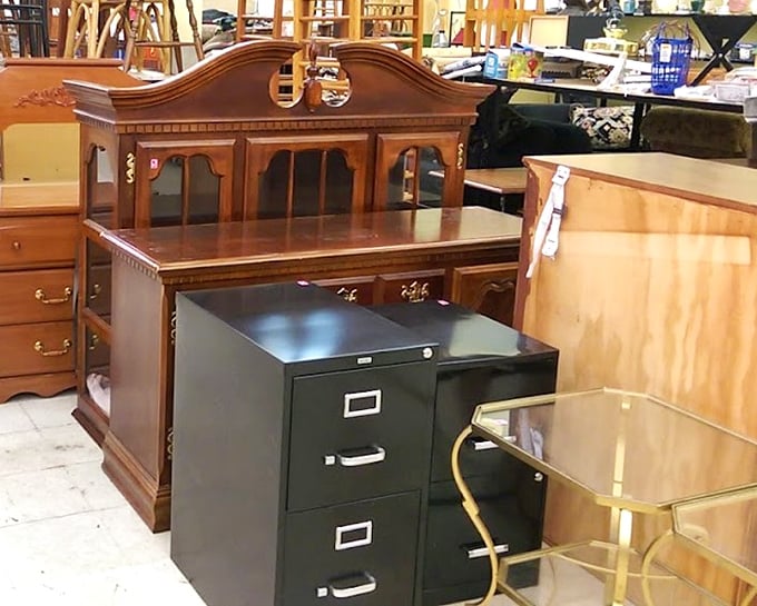 That mahogany desk has probably seen more history than most history books. Pair it with that filing cabinet for instant home-office gravitas.