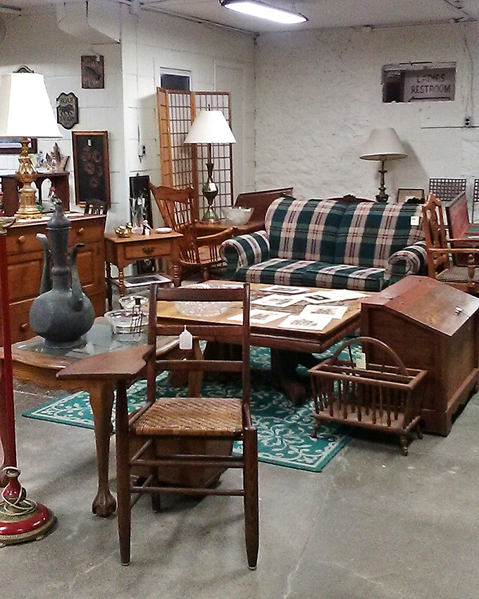 Vintage furniture creates cozy living room vignettes that make you want to settle in with a good book.