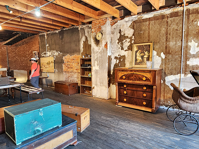 The exposed brick walls aren't just showing their age&mdash;they're displaying their character, framing furniture that's survived decades of family dinners.