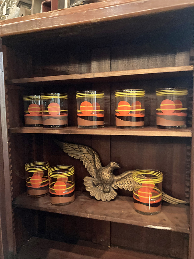 Mid-century glassware that makes your plastic cups at home suddenly feel very inadequate. That sunset design screams "cocktail hour, 1965."