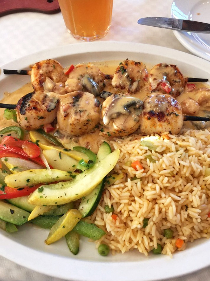 Scallops seared to golden perfection alongside colorful vegetables. The ocean and garden having a delicious summit meeting.