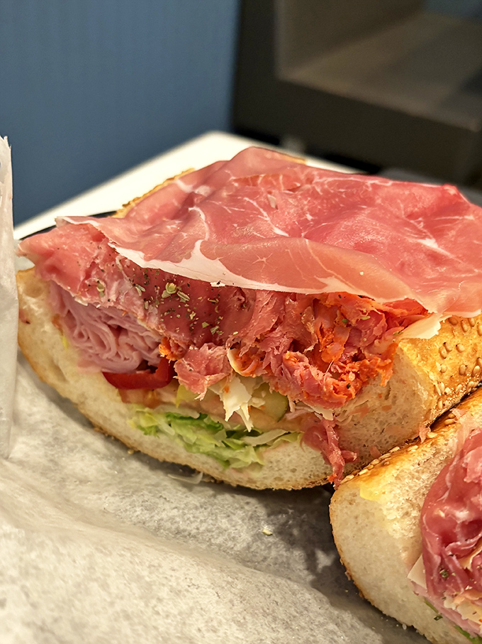 Layer upon layer of thinly sliced meat, the hallmark of sandwich artistry. This isn't just lunch&mdash;it's edible engineering at its finest.