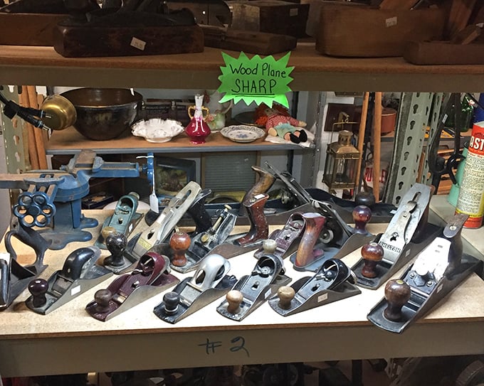 A symphony of vintage wood planes, each with the patina of projects completed and stories untold. Craftsmen, try not to drool. 