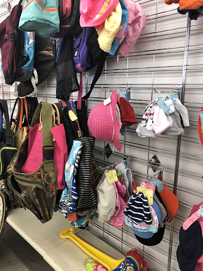 A colorful explosion of hats, bags, and childhood necessities. One shopper's donation becomes another family's budget-saving solution for the next growth spurt.