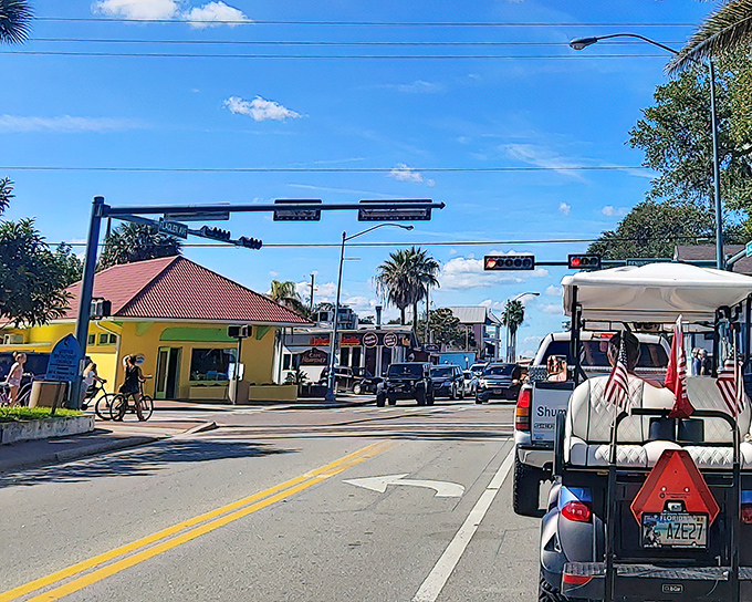 Small-town traffic jams involve golf carts and sunshine. Rush hour in New Smyrna Beach means waiting for someone to finish their ice cream cone.