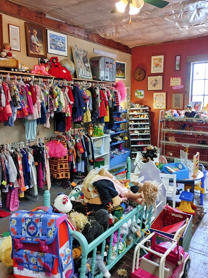 The children's section looks like a time capsule of childhood joy, where forgotten toys and colorful clothes await their second chance to create memories.