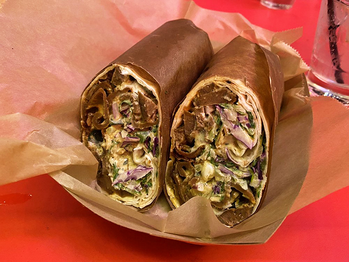 Behold the lavash wrap &ndash; a perfectly rolled bundle of joy where meat, veggies, and sauce live in harmony like the world's tastiest peace treaty.