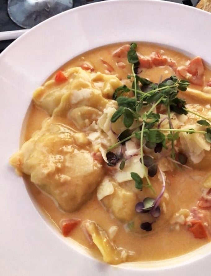 A bowl of coastal comfort that warms from within. This seafood stew showcases delicate fish and tender morsels in a broth worth sipping straight.