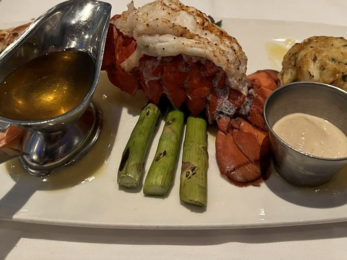 This lobster tail isn't just dinner; it's a crustacean celebration with drawn butter that glistens like liquid gold.