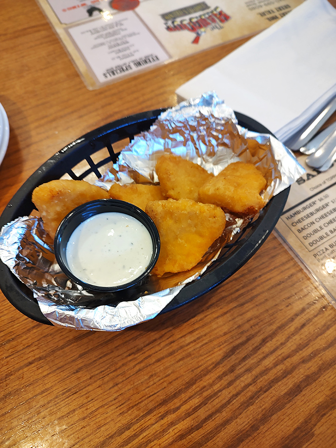 Golden nuggets of happiness await. These crispy cheese bites with their molten centers are what appetizer dreams are made of.