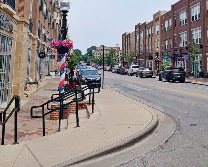 Main Street's classic barbershop pole reminds us of simpler times, when a haircut came with neighborhood gossip and retirement advice from guys who'd been there.