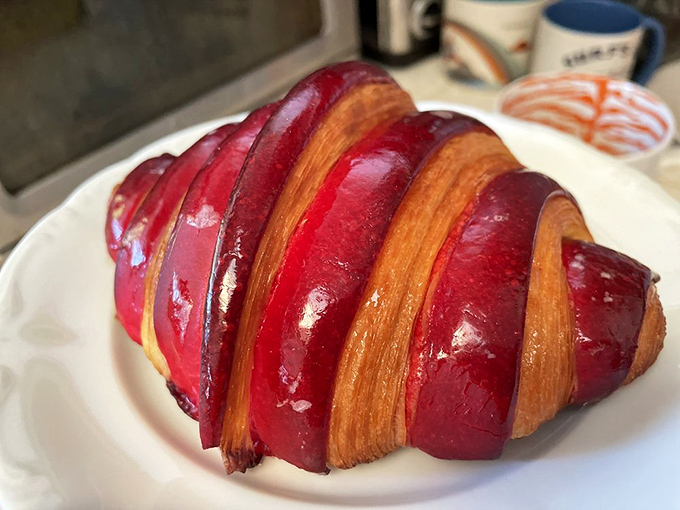 This berry-infused croissant wears its vibrant red glaze like formal attire&mdash;dressed up but still approachable, like a tuxedo t-shirt.