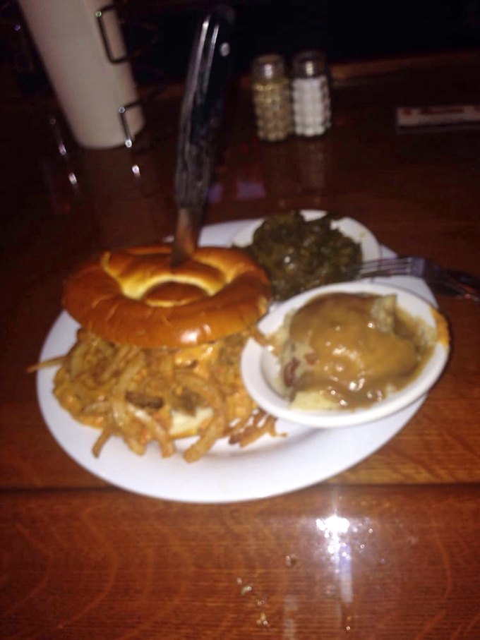 A burger that demands both hands and your full attention. The knife standing at attention seems to say, "You're gonna need backup."