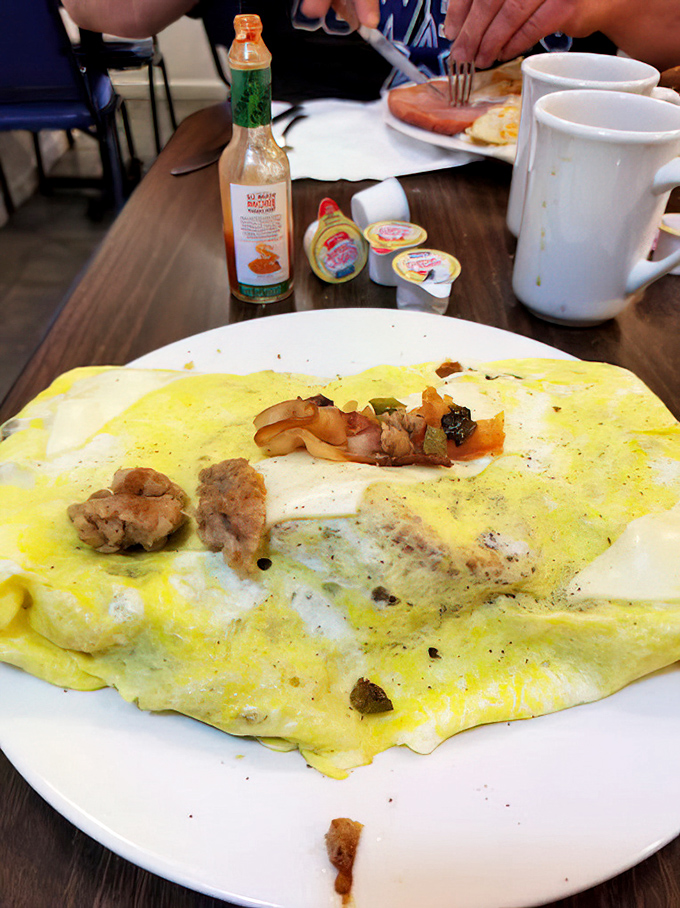 A western omelet packed with more goodness than a family reunion, folded to perfection with love.