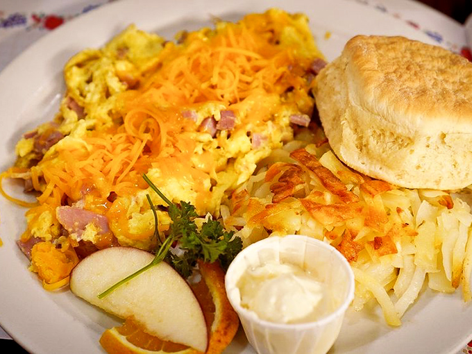This omelet doesn't just have cheese&mdash;it wears it like a proud yellow crown. Hash browns crispy enough to make a potato weep with joy.