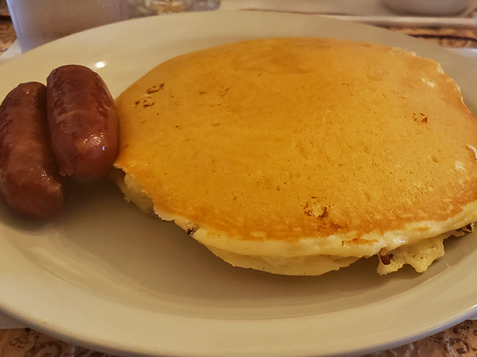 Pancakes and sausage: breakfast's perfect power couple. Golden, fluffy discs that have clearly earned their place in the Breakfast Hall of Fame.
