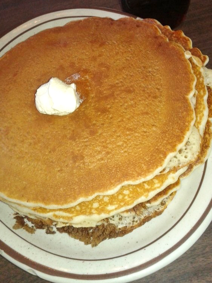 Pancakes so fluffy and inviting, they look like edible clouds that landed on your plate.