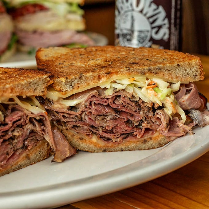 A sandwich so packed with pastrami it requires structural engineering. The melted cheese and toasted rye provide perfect support for this meaty masterpiece.