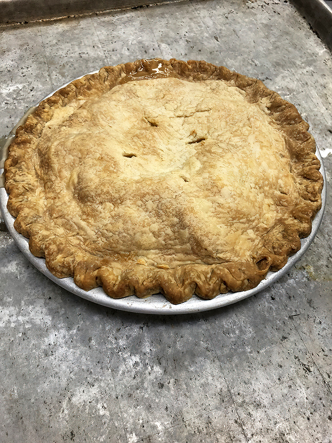 Golden, flaky homemade pie crust that whispers of grandmothers' kitchens and simpler times when dessert was an art form.