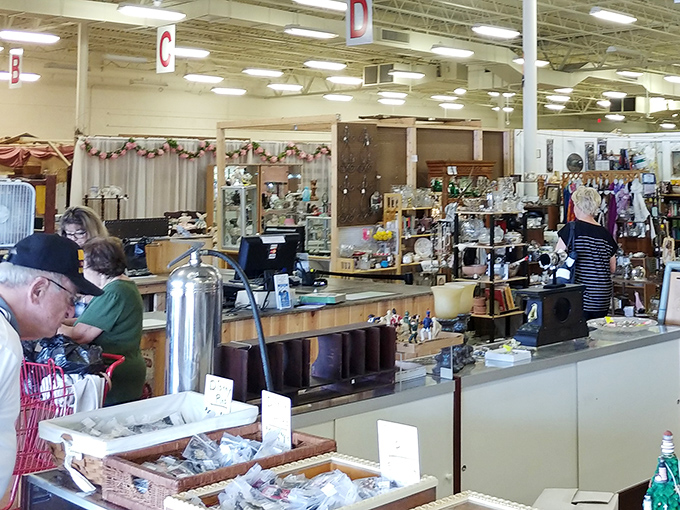 The checkout counter buzzes with stories of found treasures and the one that got away. Everyone leaves with a tale.