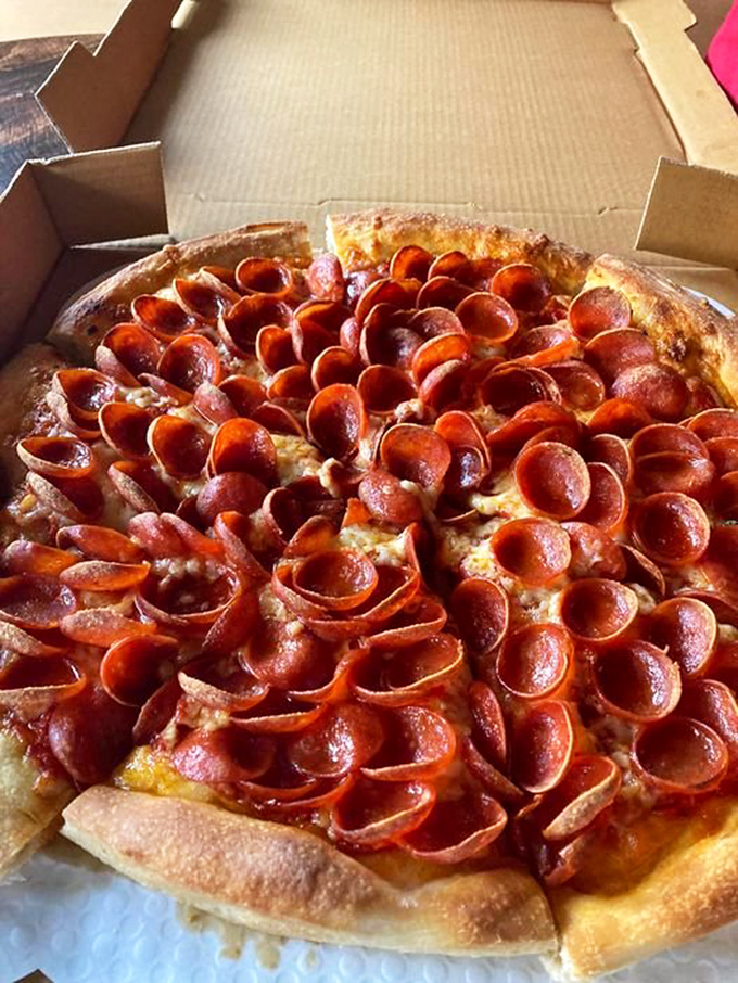 Pepperoni paradise! Those crispy-edged cups holding tiny pools of savory goodness are what pizza dreams are made of.