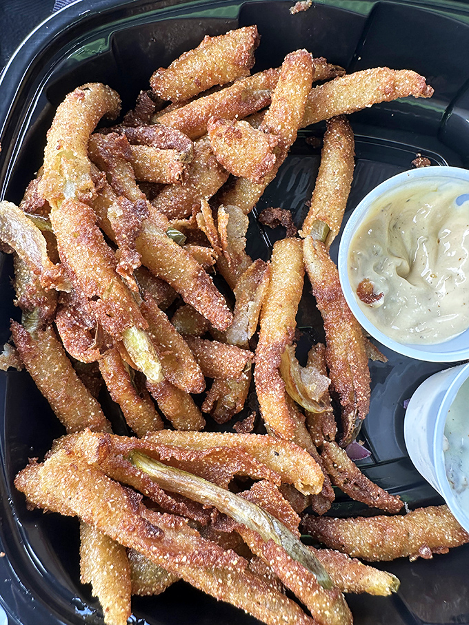 Pickle fries&mdash;the side dish you didn't know you needed in your life. Tangy, crunchy strips of happiness with dipping sauce for good measure.