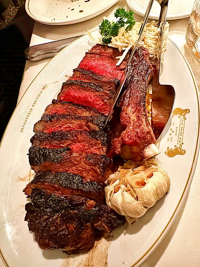 Behold the star of the show—a prime rib so perfectly cooked it makes vegetarians question their life choices. Meat poetry on a plate.
