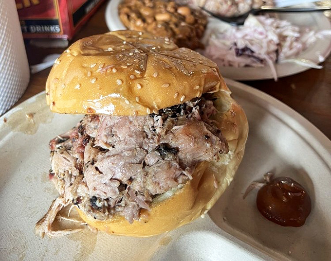 The humble sesame bun struggles valiantly to contain a mountain of pulled pork&mdash;a delicious David and Goliath story where everyone wins.