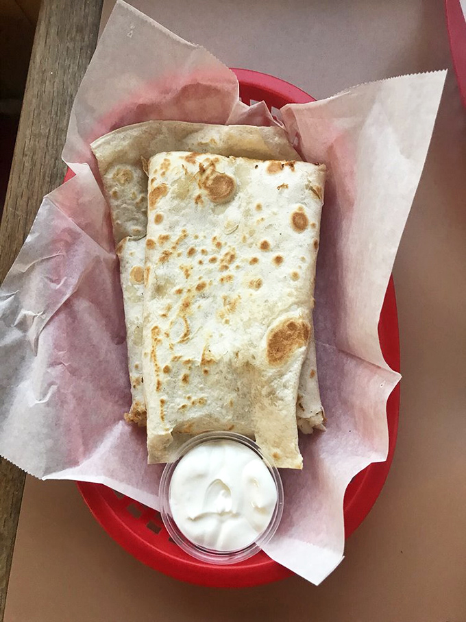 Quesadillas so authentic they should come with their own passport. That side of sour cream is about to embark on a delicious journey.