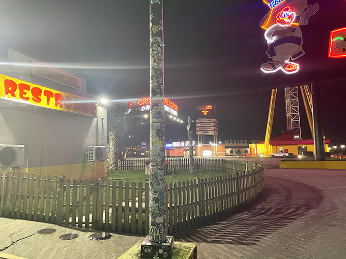 Even the restroom signage glows with neon enthusiasm at night. South of the Border ensures your pit stops are never boring. 