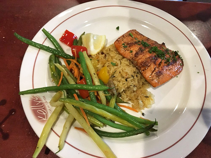 Salmon that's been kissed by flame and paired with colorful vegetables&mdash;proof that healthy eating doesn't have to be punishment.