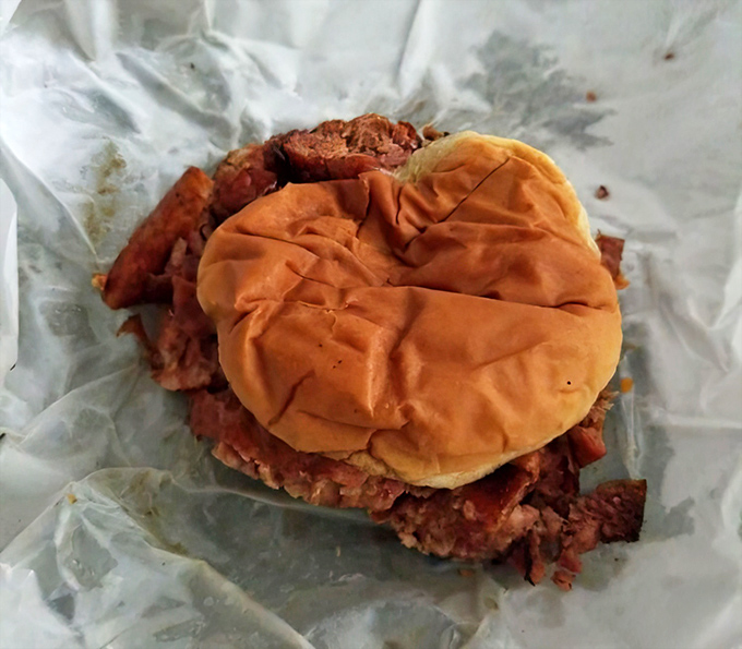 Another sandwich masterpiece where the bread is merely a delivery system for smoky, tender sausage that's been perfected over decades.