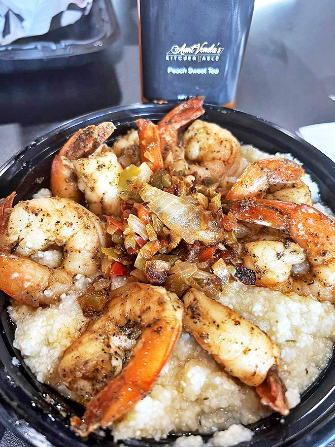 Shrimp so perfectly seasoned and saut&eacute;ed, they're practically doing a happy dance atop that bed of creamy grits.
