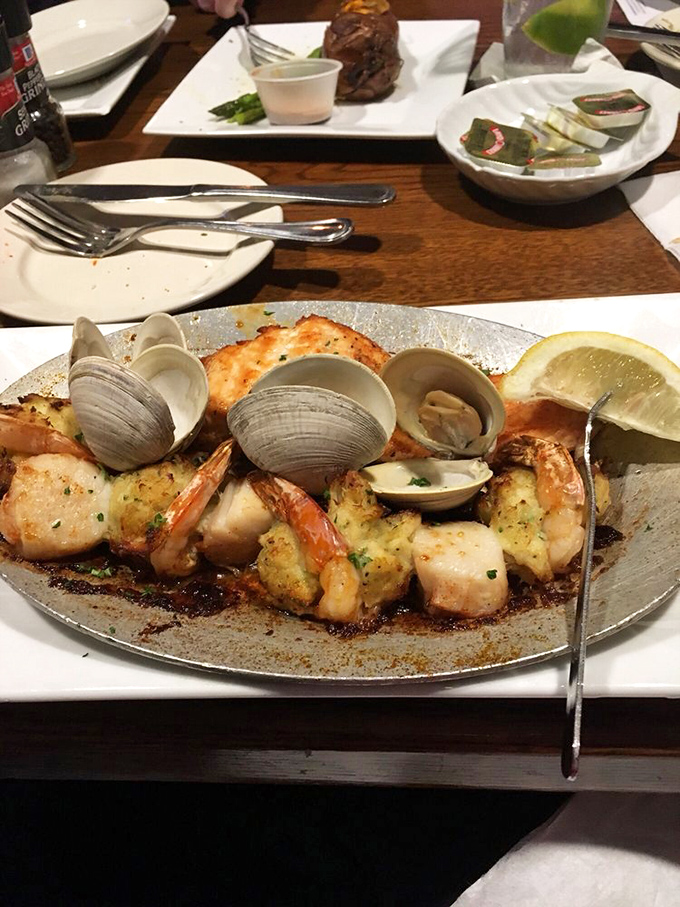 The seafood platter that answers the eternal question: "Why choose one when you can have it all?" Clams, shrimp, and scallops in perfect harmony.