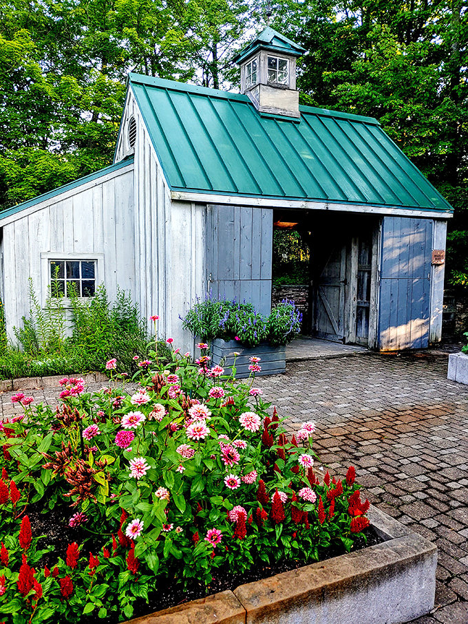 Not just a shed, but a storybook cottage. This charming structure looks like it's waiting for a gardening gnome to clock in for work.