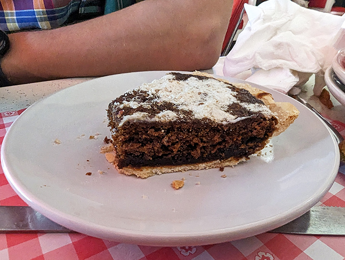 Shoofly pie&mdash;Pennsylvania Dutch soul food on a plate. This molasses masterpiece proves some traditions are worth preserving, especially when dusted with powdered sugar.