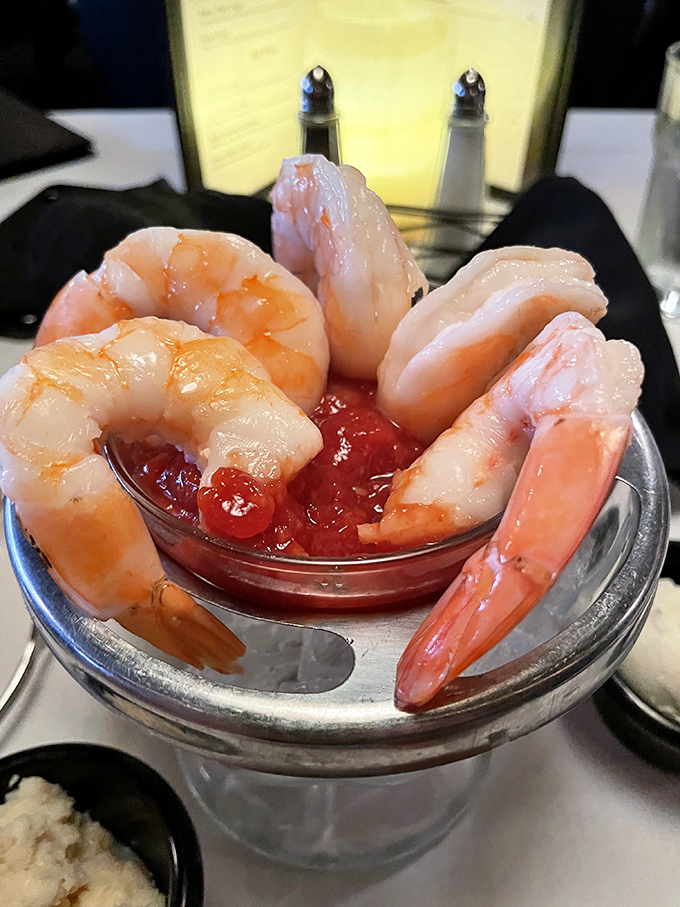 The shrimp cocktail &ndash; where each crustacean curves around the dish like synchronized swimmers performing in a pool of zesty cocktail sauce.