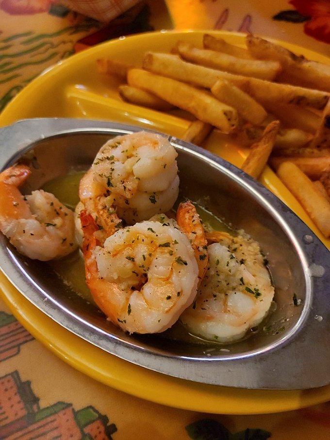 Butter-bathed shrimp scampi that makes you wonder why you ever order anything else. Simple perfection on a plate.
