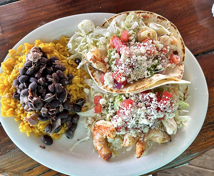 Soft tortillas cradle perfectly seasoned shrimp in a handheld symphony of coastal flavors and textures.