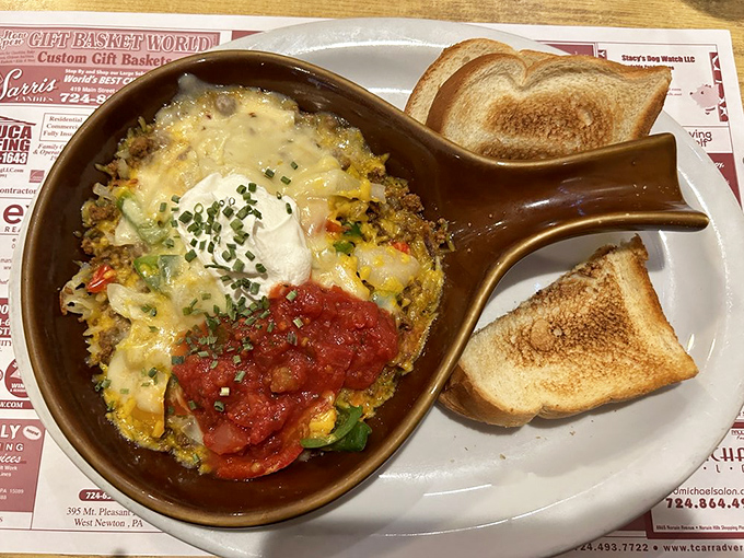 Skillet breakfasts: where ingredients that were perfectly fine on their own form a beautiful democracy of flavors, topped with a dollop of sour cream for good measure.