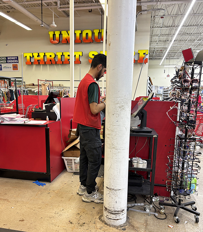The checkout area &ndash; the final frontier between you and your thrifted treasures, staffed by veterans of the secondhand universe.