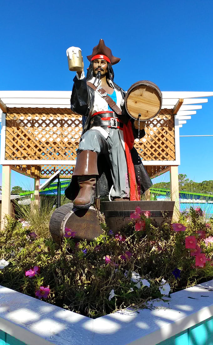 This pirate statue stands guard at what appears to be a local watering hole, raising his mug as if to toast the affordable lifestyle that awaits.