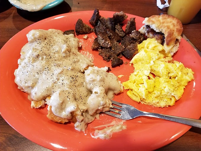 The breakfast of champions: biscuits smothered in peppery gravy, scrambled eggs, and steak cooked just right. Monday morning motivation at its finest!