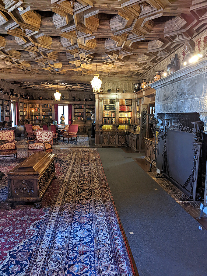 That honeycomb ceiling wasn't created by overachieving bees. The Gothic Study showcases craftsmanship so intricate it makes modern prefab furniture seem like a practical joke.