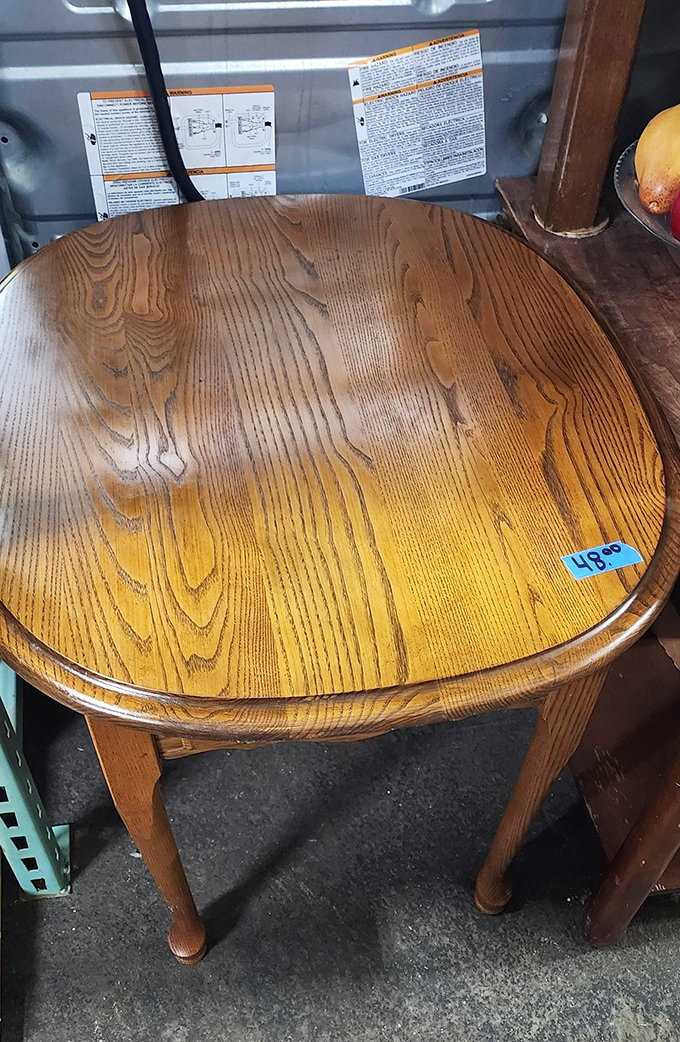 This solid oak table has witnessed more family dinners than a Norman Rockwell painting. At $45, it's practically begging to join yours.