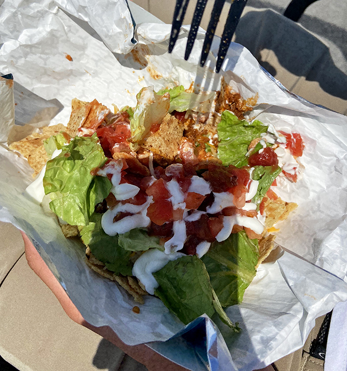 Fresh ingredients transform a simple taco salad into an island fiesta&mdash;crisp lettuce, diced tomatoes, and drizzles of sauce creating edible vacation memories.