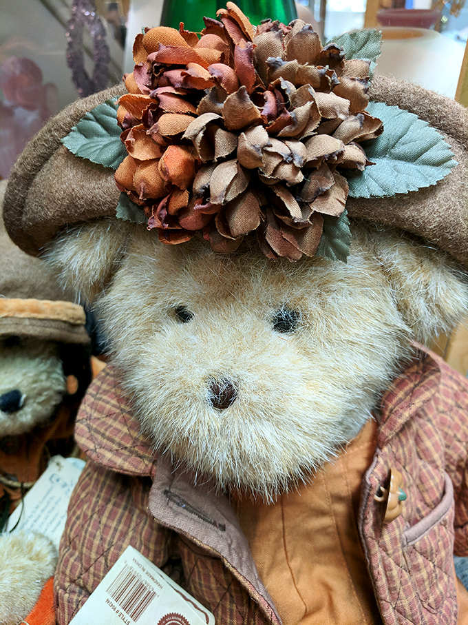 This teddy bear has seen things. With his floral crown and plaid jacket, he's like the retired rockstar of the stuffed animal world.