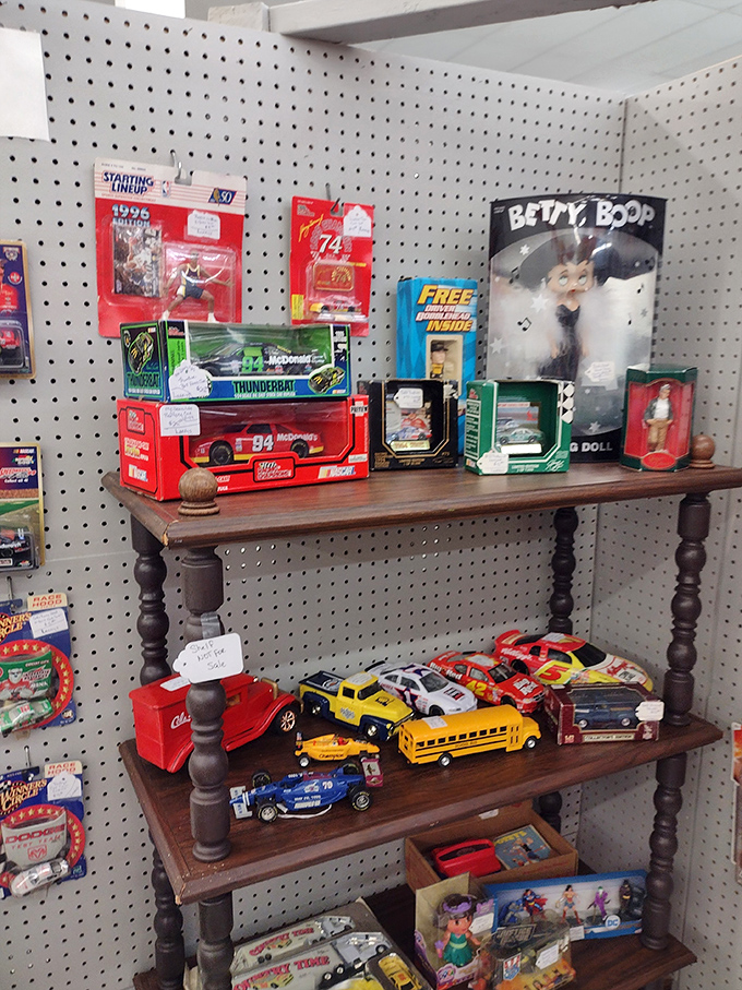 Vintage toys that transport you back to Saturday morning cartoons. NASCAR memorabilia and Betty Boop share shelf space in this time capsule of American entertainment.